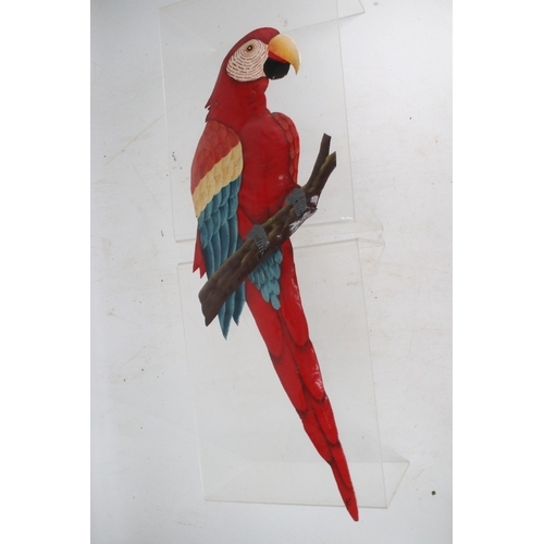 Metal wall plaque in the shape of a Macaw
