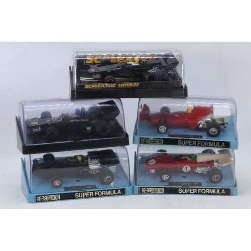 Five vintage scalextric slot cars to include C126 lotus, Ferarris etc