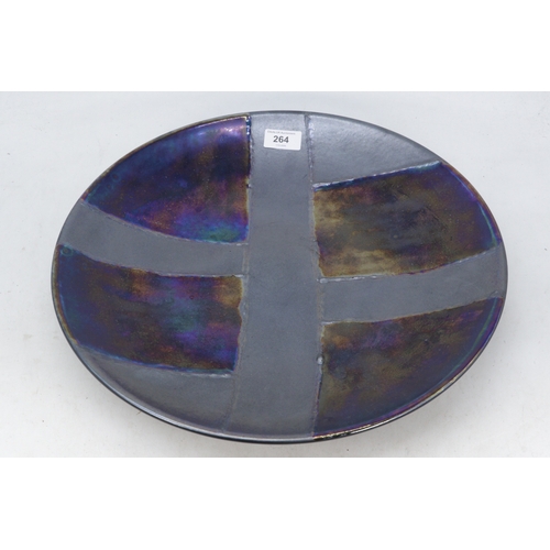A Poole Pottery Alchemy plate (approx. 42cm diameter)