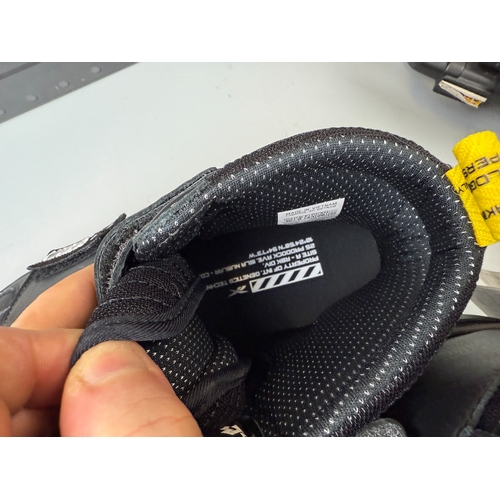 Pair of Reebok Jurassic Park X Alien Stomper Security Sneakers in Black ...