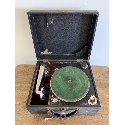 A vintage 'Academy' wind-up gramophone plus seven boxes and tubs of 78 ...