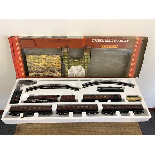 A boxed Hornby R542 Duchess Mail Train set (box with age and storage ...