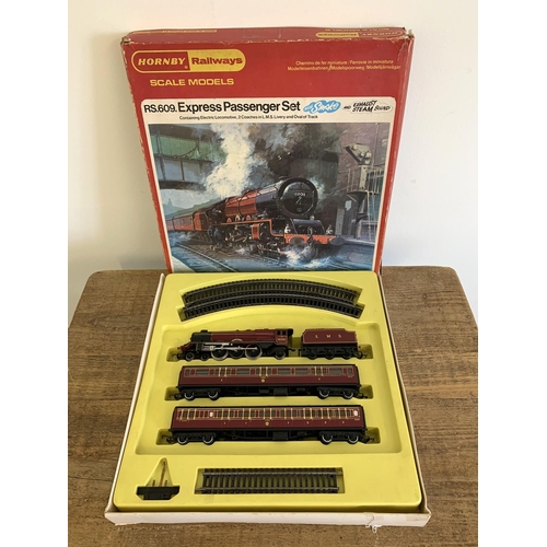A boxed Hornby RS 609 Express Passenger set (box with age and storage ...