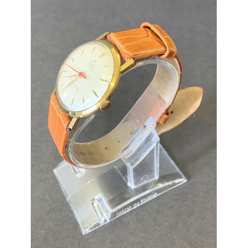 A vintage 1950's/60's Roidor wristwatch on brown leather strap, 32mm ...