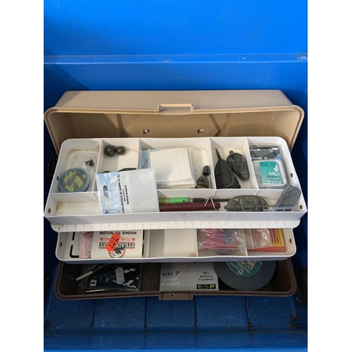 A Shakespeare tackle box with octopus legs and a small box of terminal ...