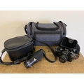 A Chinon CE-4 35mm camera together with bag and accessories plus a ...