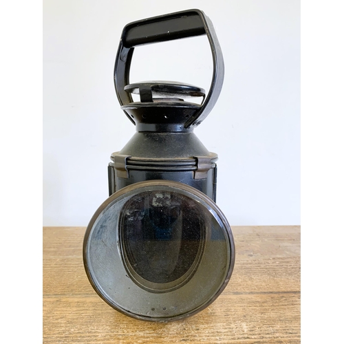 A vintage British Rail lamp with three colour lenses, complete with ...
