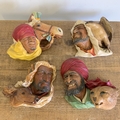 Four vintage larger sized Bossons Arab head figures, each including an ...
