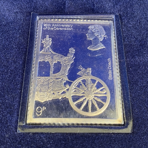 A cased 1978 Danbury Mint sterling silver replica of the 9p State Coach ...