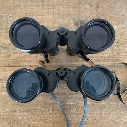 A pair of Mark Scheffel 10x50 binoculars, a pair of Charles Frank 10x50 ...