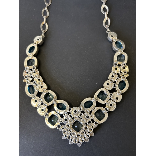 A large 925 sterling silver and blue stone set necklace plus a 925 ring ...