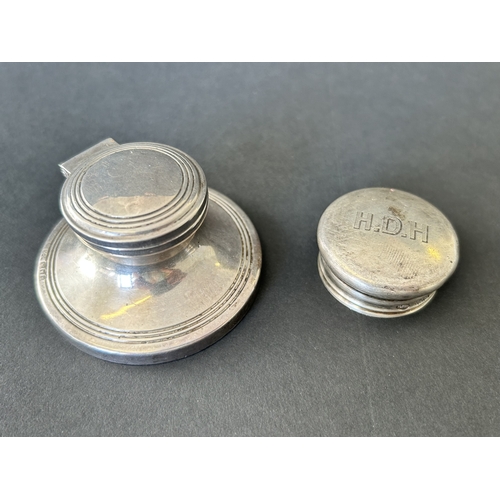 A small hallmarked silver Capstan inkwell with glass liner plus a ...