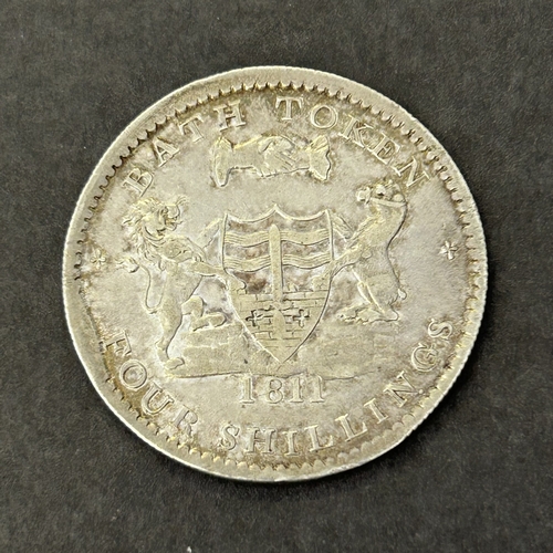 A silver four shilling bath token 1811 given by S Whitchurch ...