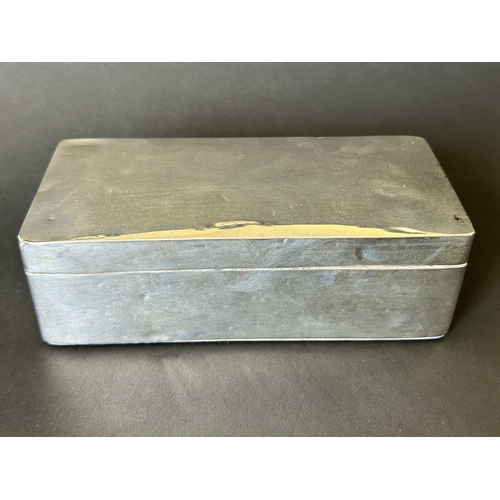 A hallmarked silver table cigarette box with wood lined interior ...