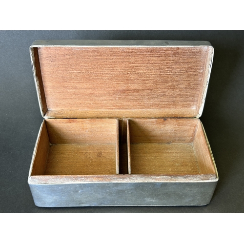 A hallmarked silver table cigarette box with wood lined interior ...