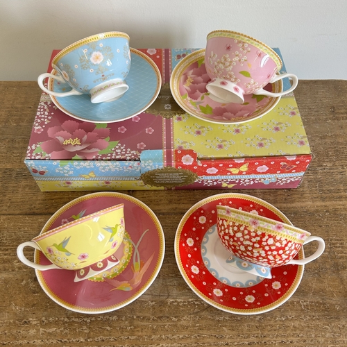 A boxed 'Cashmere Enchante' four setting tea set by Maxwell and ...