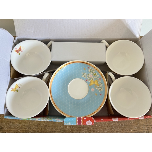 A boxed 'Cashmere Enchante' four setting tea set by Maxwell and ...
