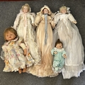 Three Cindy McClure porcelain head dolls in long dresses plus two others