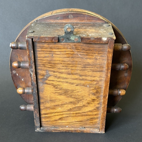 A vintage oak framed day, date and month rotating calendar, all parts ...