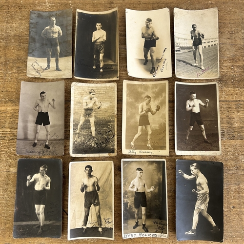 A large collection of circa 1930's photographic postcards of boxers ...