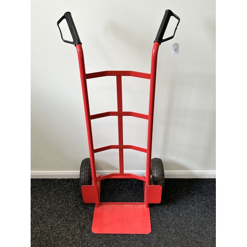 A red sack barrow, 46" high x 21" wide