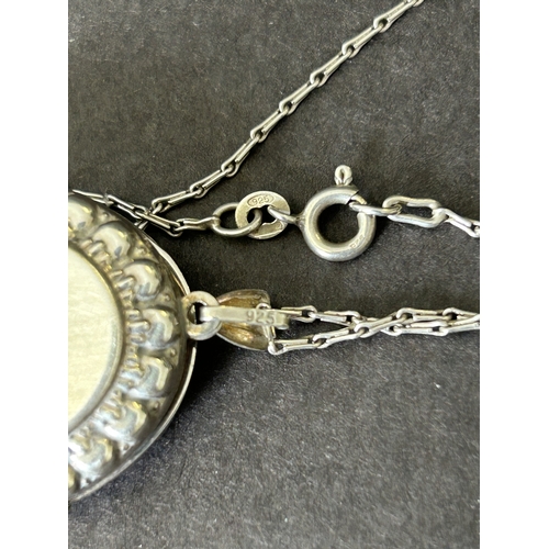 A Chester hallmarked silver bangle plus a white metal locket on 925 ...