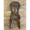 A vintage mahogany campaign folding boot jack with internal boot hooks ...