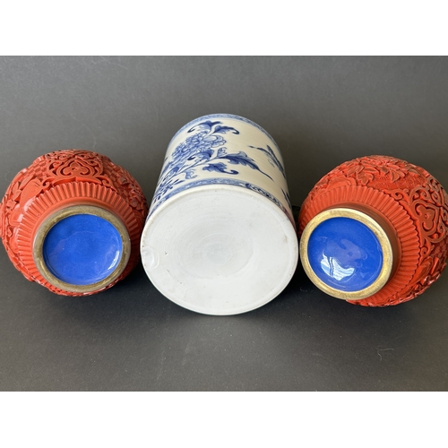 A pair of vintage Oriental carved cinnabar lacquer over pottery body ...