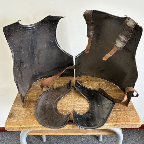 Three parts of vintage re-enactor armour pieces including front and ...
