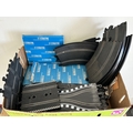 A box of Scalextric track and accessories