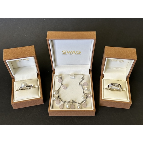 Two 925 sterling silver 'Swag' rings plus a necklace