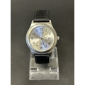 A quartz Avia wristwatch in its original box (with wear)