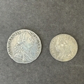 A 1787 George III silver shilling together with a 1757 George II ...