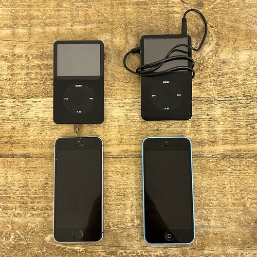 Two vintage iPhones together with two vintage iPod's (various ...