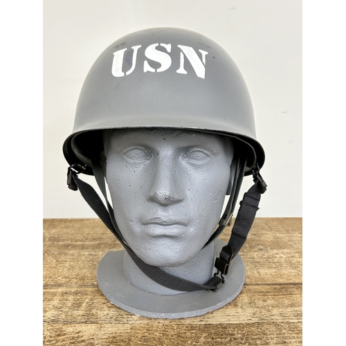 A vintage COPY of a U.S. Navy (USN) M1 helmet in grey, this comes with ...