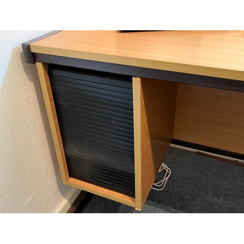 Office desk with shelves and roller shutter