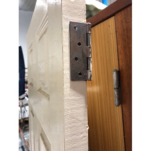 Very Heavy exterior door with fittings and hinges. Primed.