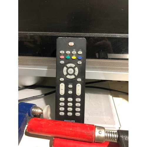 Phillips Colour TV with remote control on stand. Working