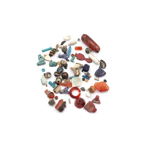 A Collection of Egyptian Beads. Contains: Glass Beads, Carnelian Beads ...