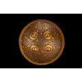 An Indian Gilded Iron Shield with Calligraphic and Floral Decoration. A ...