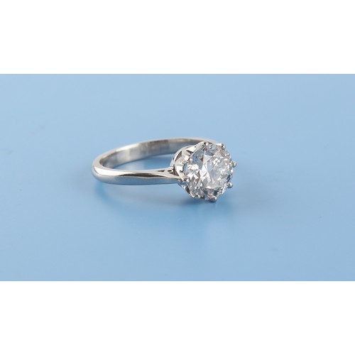 A platinum diamond single stone ring, the round brilliant cut diamond ...