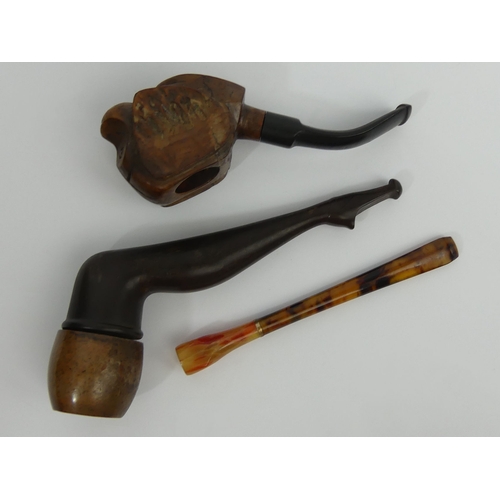 Bakelite stockinged leg pipe, dogs head pipe and a 1930's cigarette ...