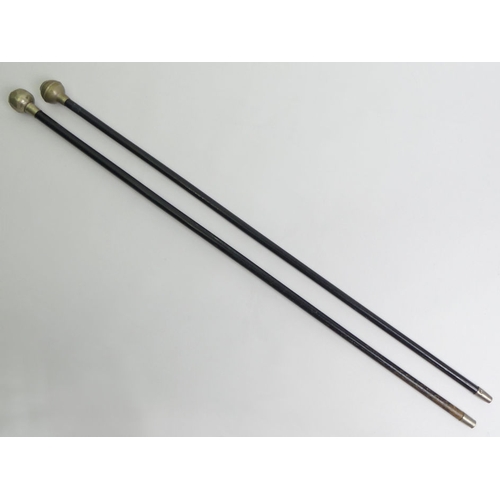 Two Britiish army swagger sticks.