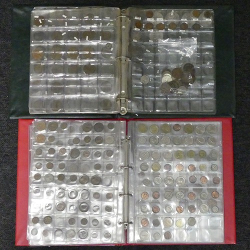 Two folders of mostly British coins including some silver examples and ...