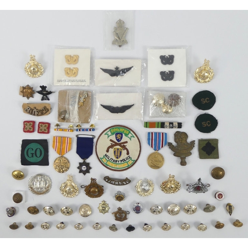 A quantity of military cap badges, including Northamptonshire Regt. two ...
