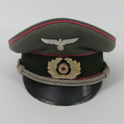 A WWII Third Reich Heer Panzer officer's Schirmmutze peaked cap with ...