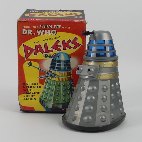 A battery operated Dr Who Dalek by Louis Marx & co complete with the ...