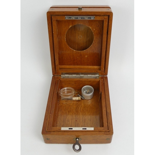 A Robert Edmund Burrett, London 1505 marine chronometer, in a military ...