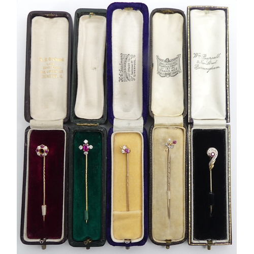 Five ruby and diamond stick pins all in boxes, 7 grams, largest 16.8mm ...