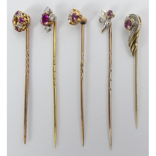 Five ruby and diamond stick pins all in boxes, 7 grams, largest 16.8mm ...